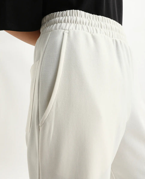 Buy Perk - Off White Solid Wide Leg Trackpant| Rareism